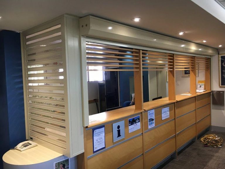 shopfront security mesh shutters - Rollashield Shutters